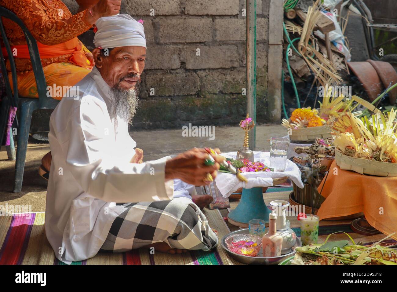 The Hindu Priest or widely known as Pedanda by the Balinese, blessing ...