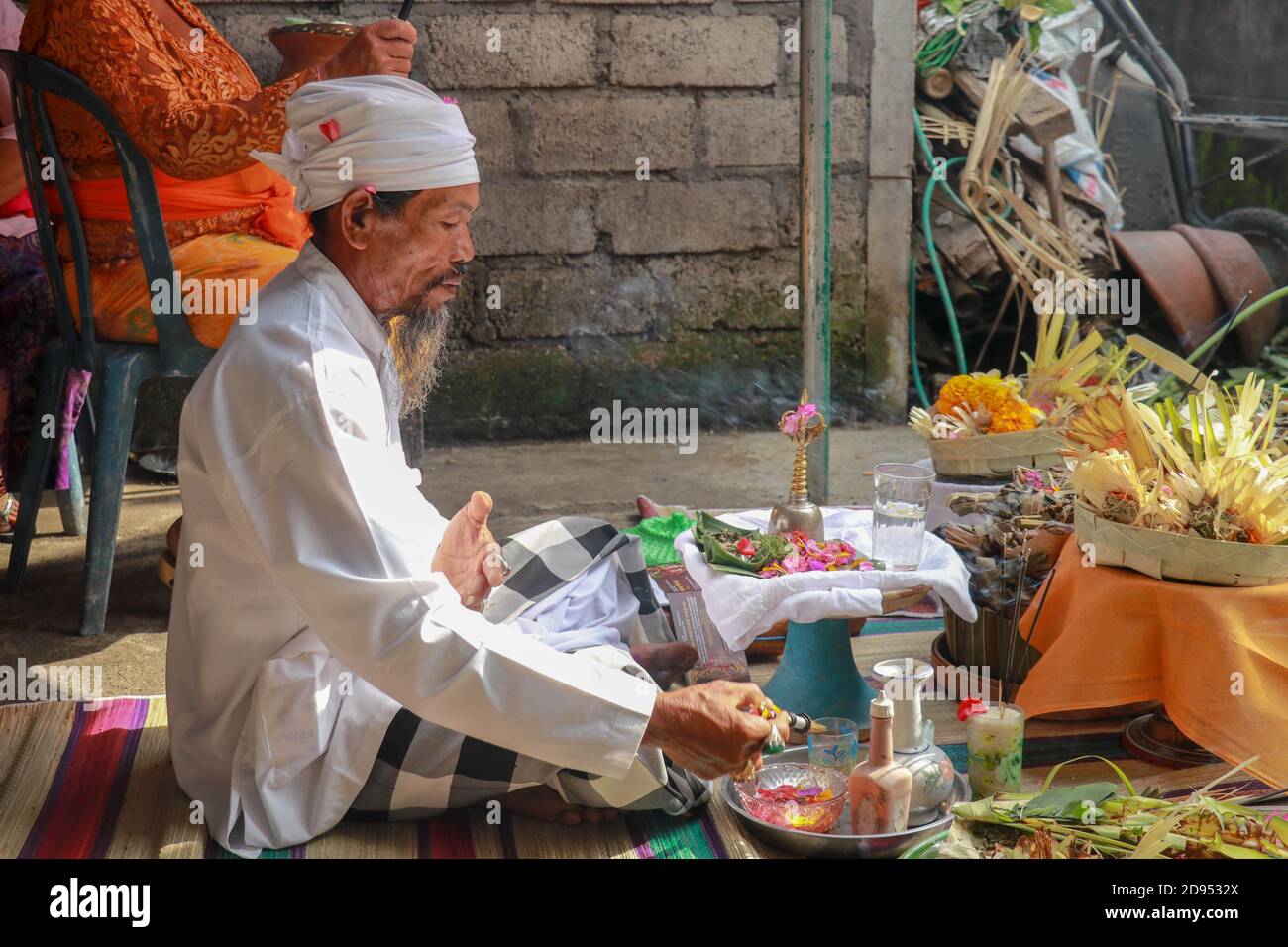 The Hindu Priest or widely known as Pedanda by the Balinese, blessing ...
