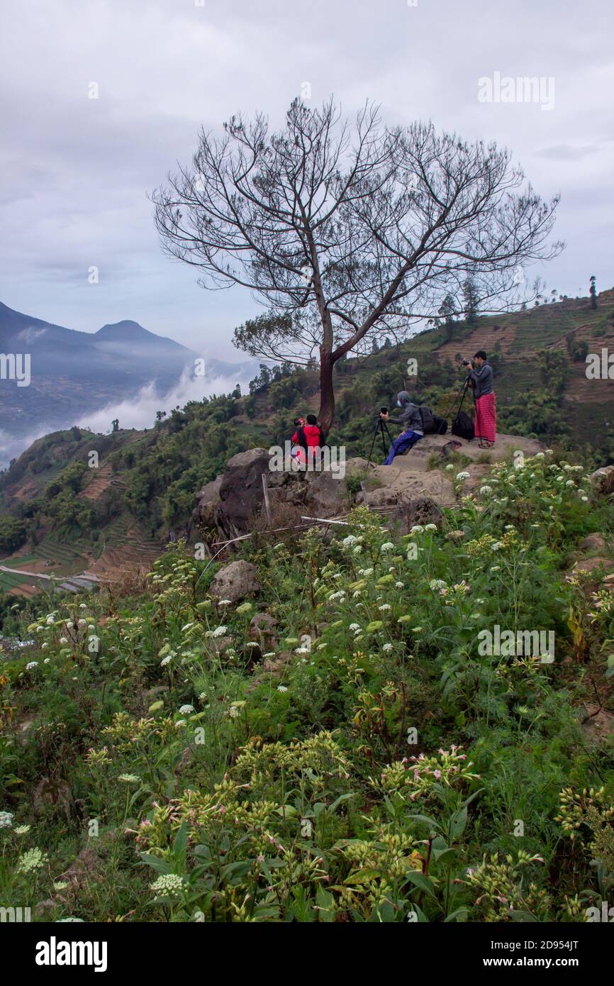 Wonosobo, Indonesia. October 2020. a group of young photographers ...