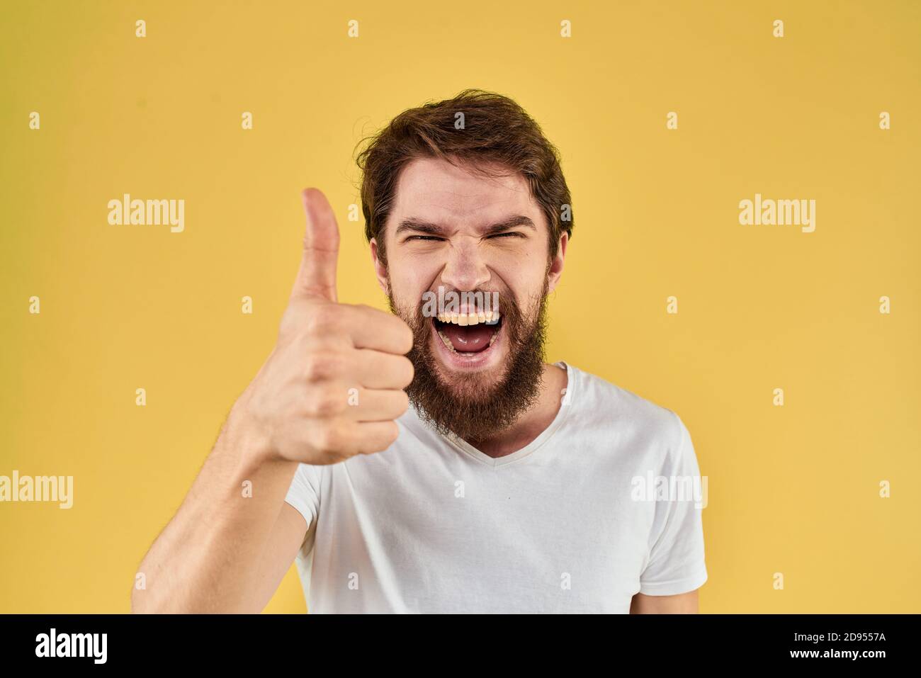 Bearded man emotions fun gesture with hands white t-shirt close-up ...