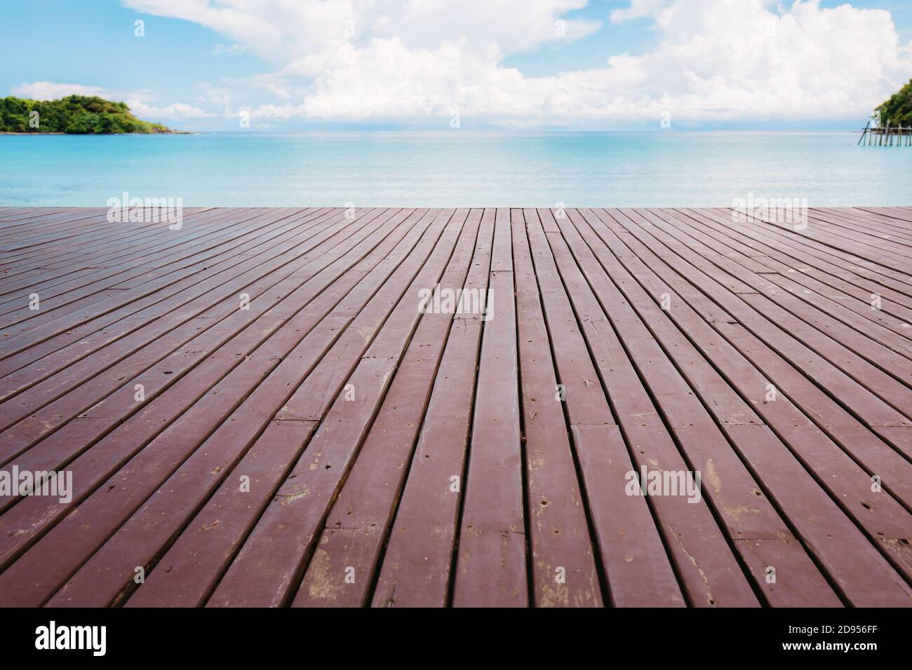 Wooden of plank on beach at sea with the sky Stock Photo - Alamy