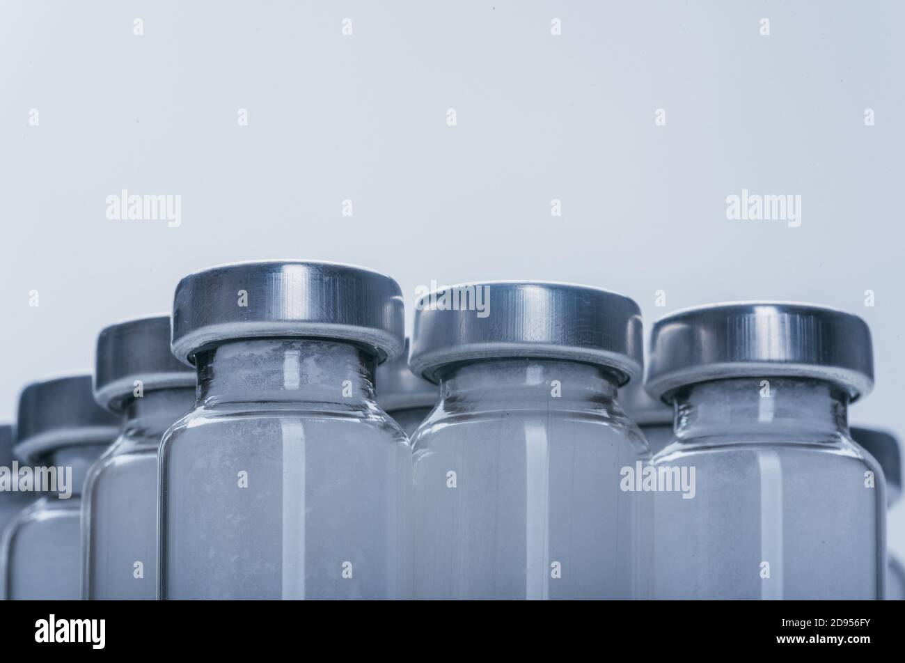 Glass medical ampoule vial for injection. Medicine is dry white drug ...