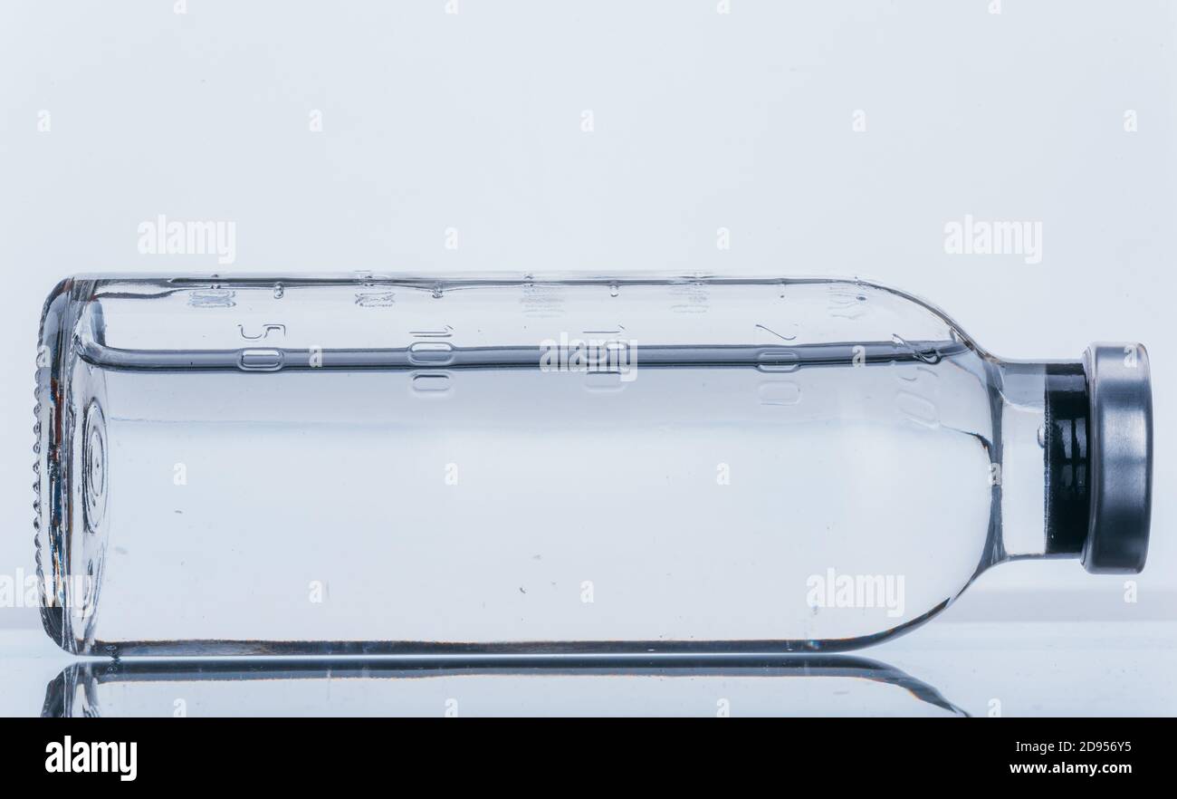 Glass medical ampoule vial for injection. Medicine is dry white drug ...