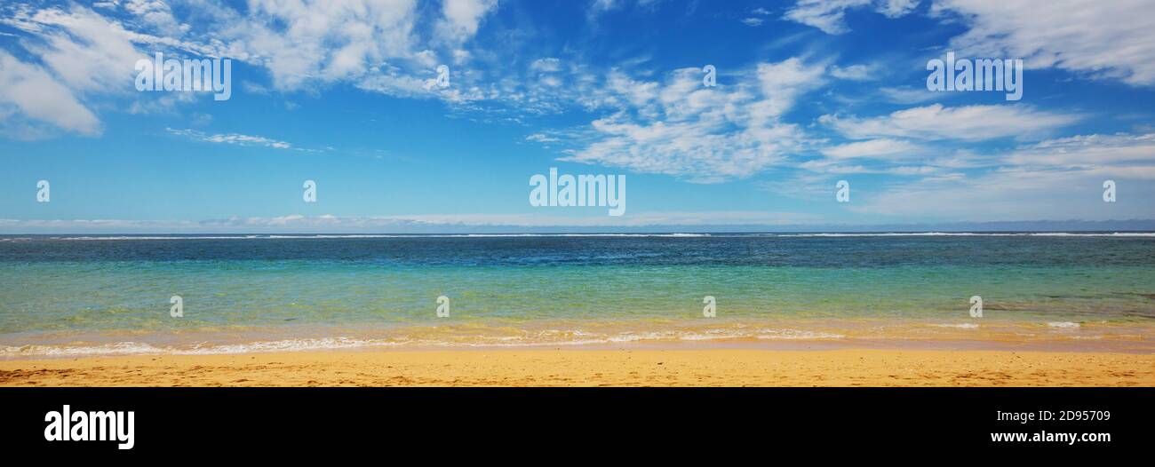Amazing hawaiian beach. Wave in ocean at sunset or sunrise with surfer ...