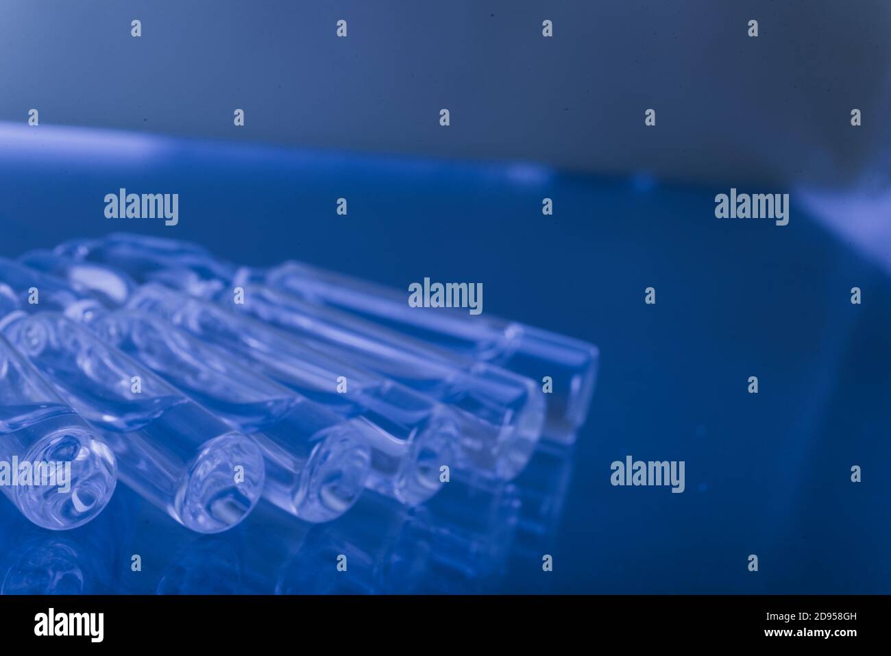 Glass medical ampoule vial for injection. Medicine is liquid sodium ...