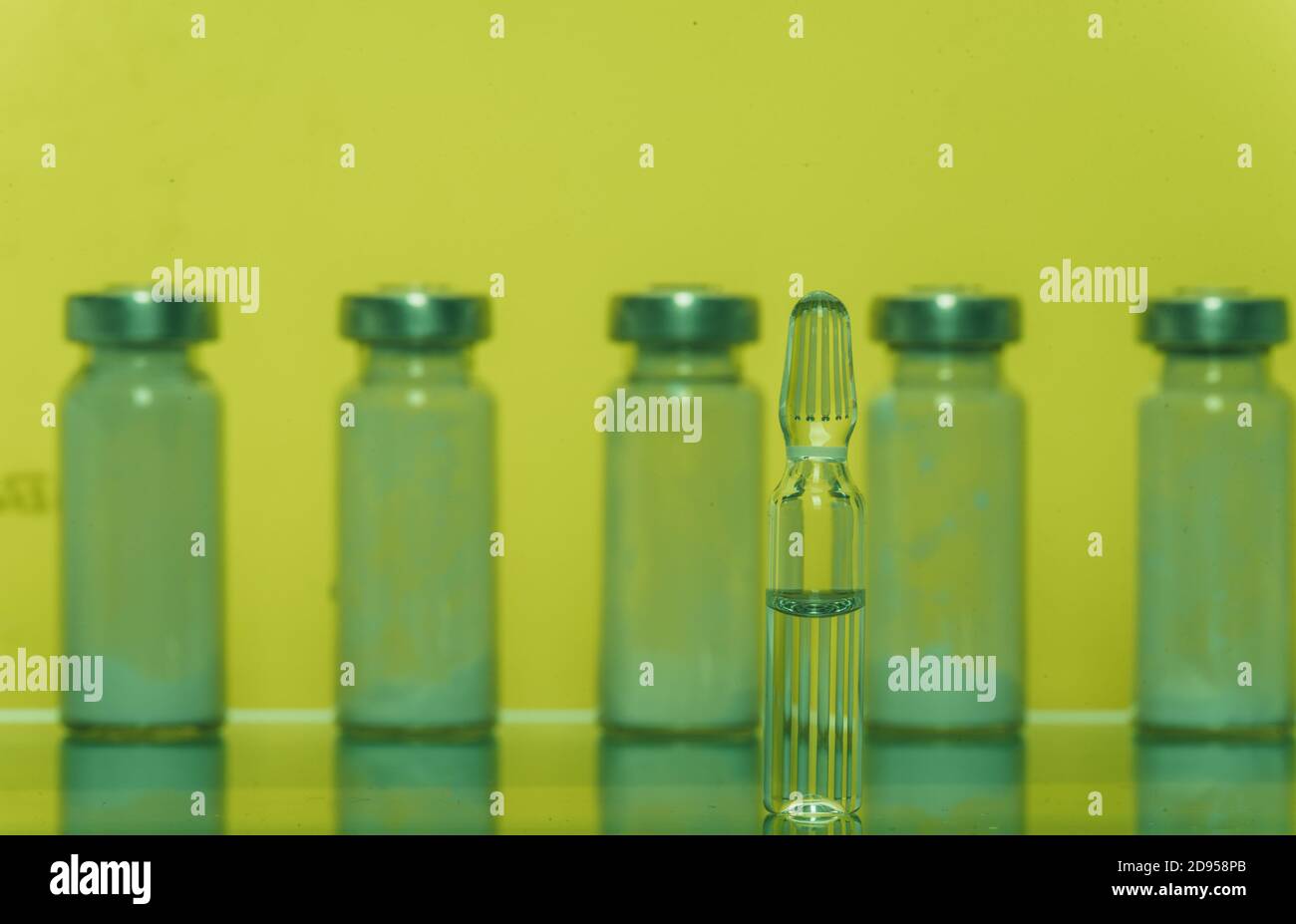 Glass medical ampoule vial for injection. Medicine is liquid sodium ...