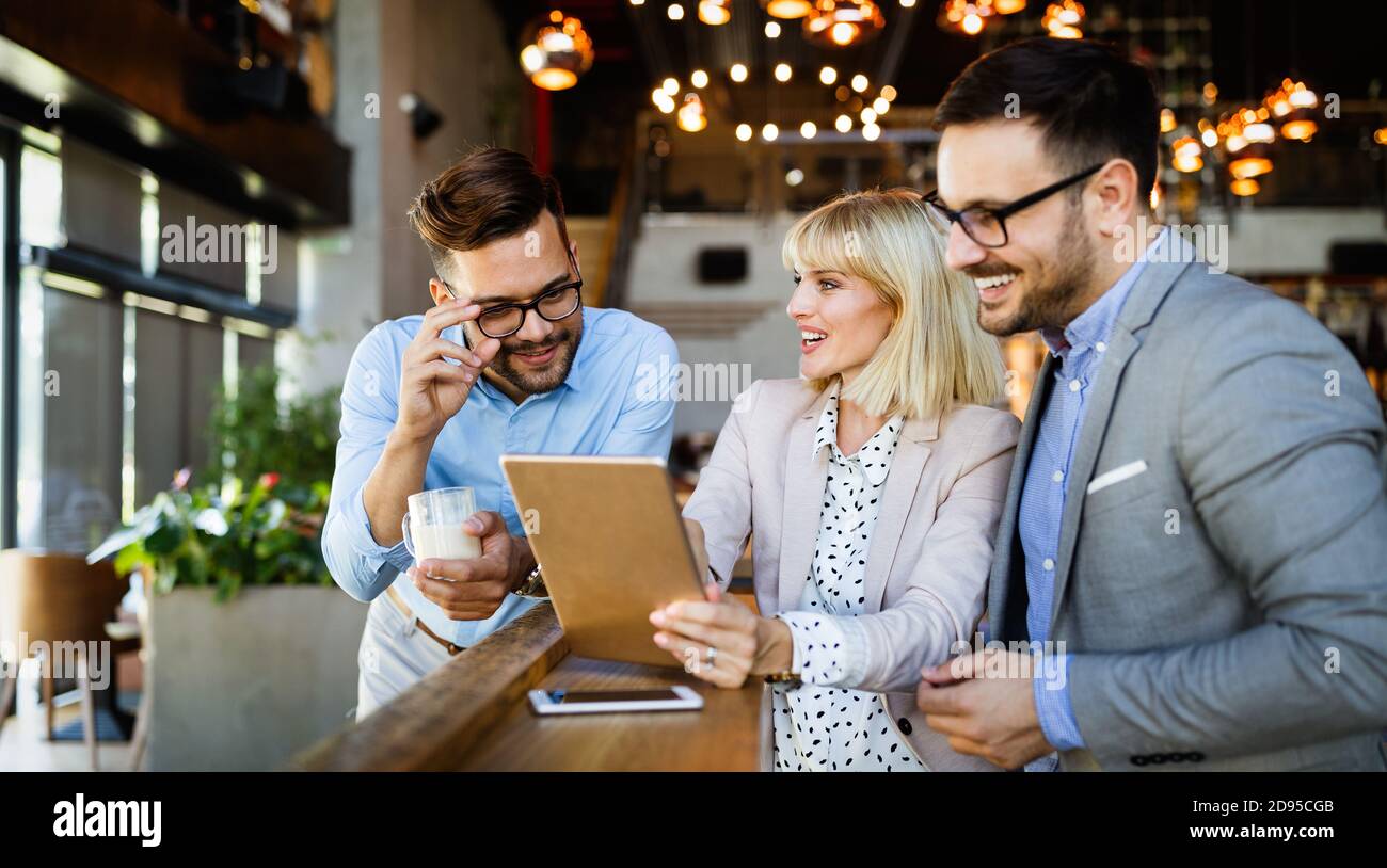 Business colleagues having conversation during coffee break Stock Photo ...