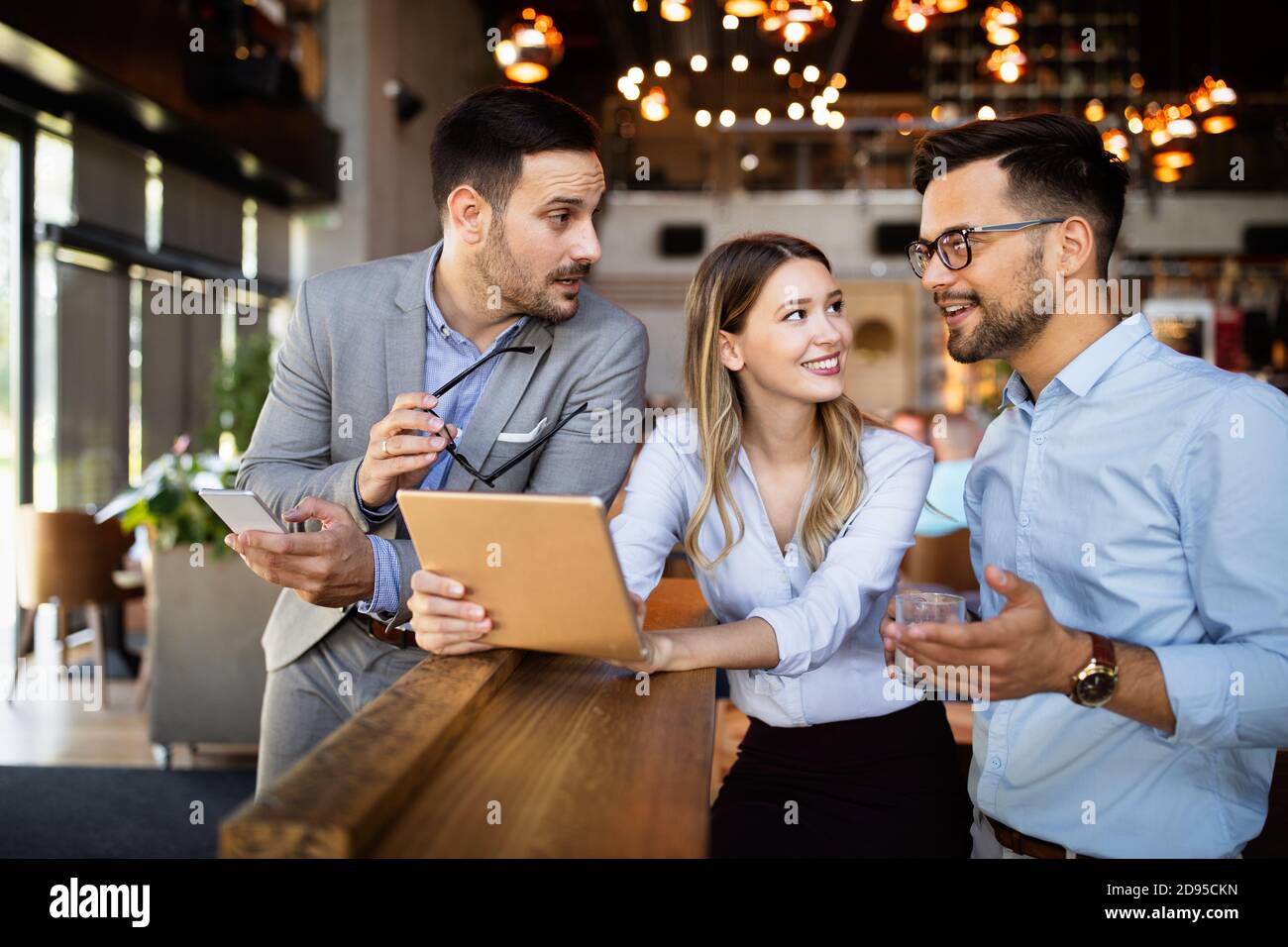 Business colleagues having conversation during coffee break Stock Photo ...
