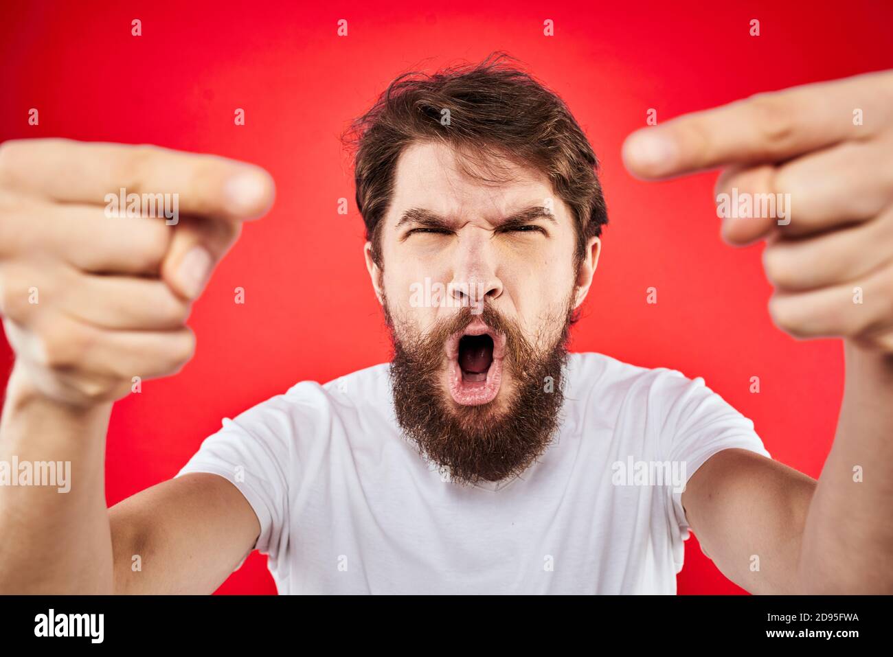 bearded man gesturing with hands white t-shirt emotions facial ...
