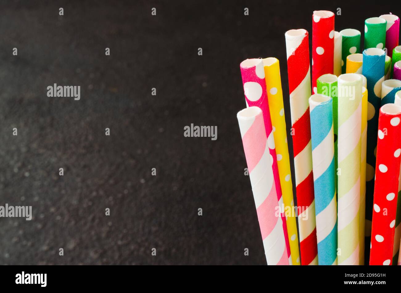Colorful paper straws of different colors for cocktails and drinks on ...