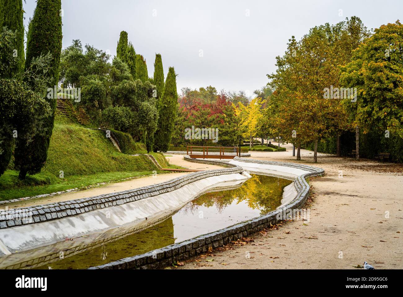Scene of the Buen Retiro Park in Madrid during the fall with vibrant ...