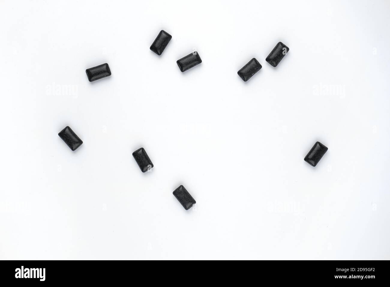 Image of black gum pads on white background Stock Photo - Alamy