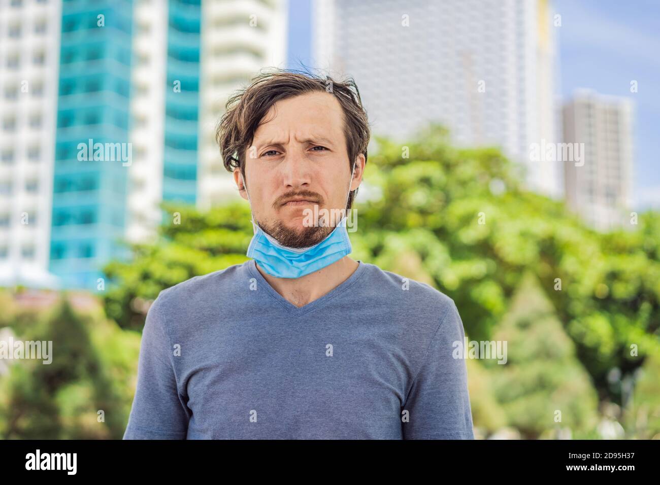 Improper wearing of mask concept. Man wearing mask wrong Stock Photo ...