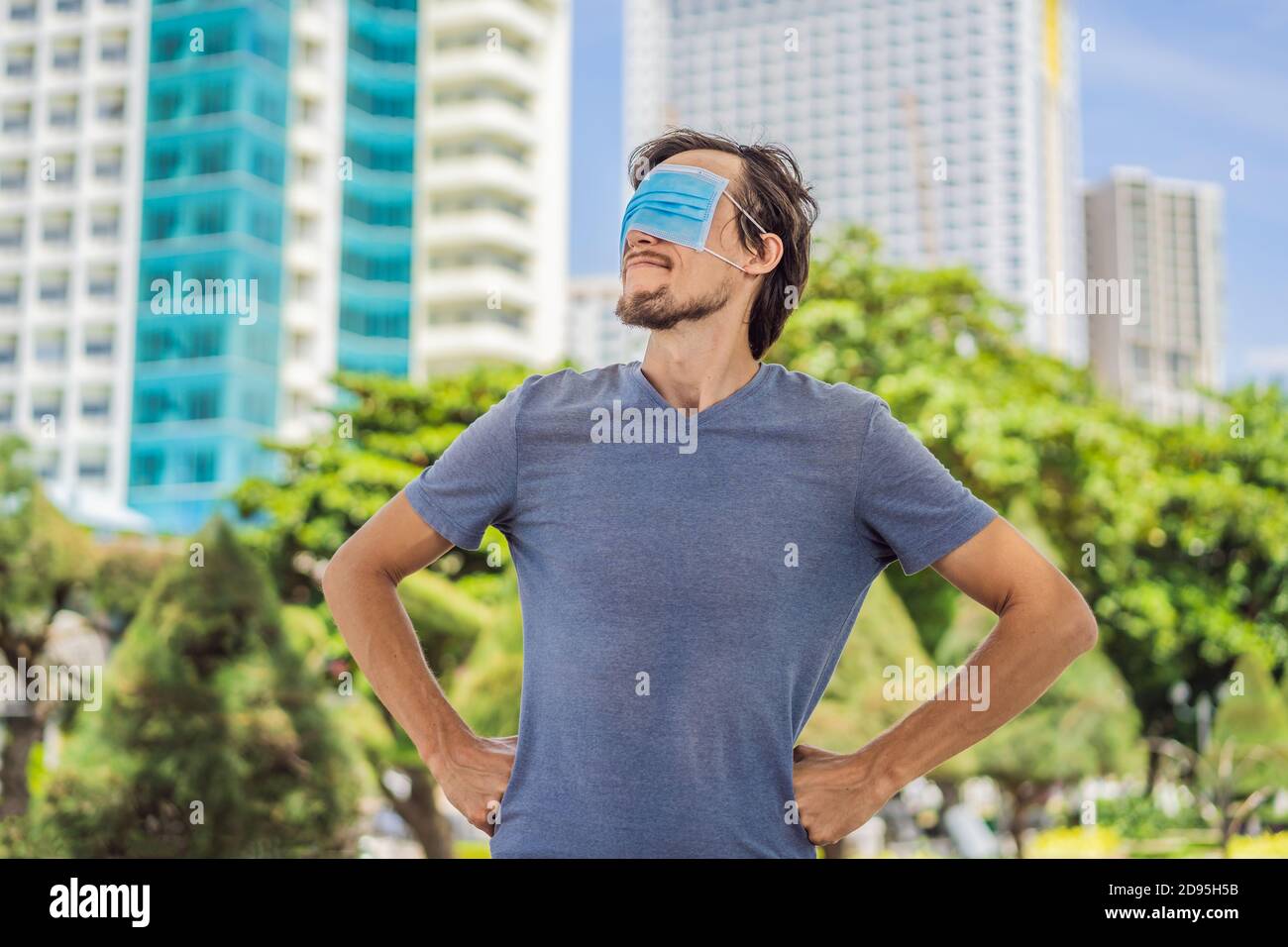 Improper wearing of mask concept. Man wearing mask wrong Stock Photo ...