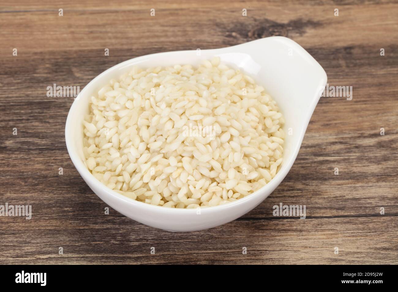Raw Arborio rice for Italian risotto Stock Photo - Alamy
