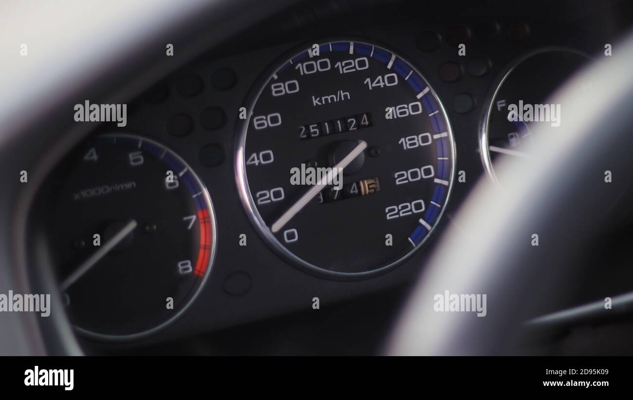 Speedometer and tachometer on the dashboard Stock Photo - Alamy