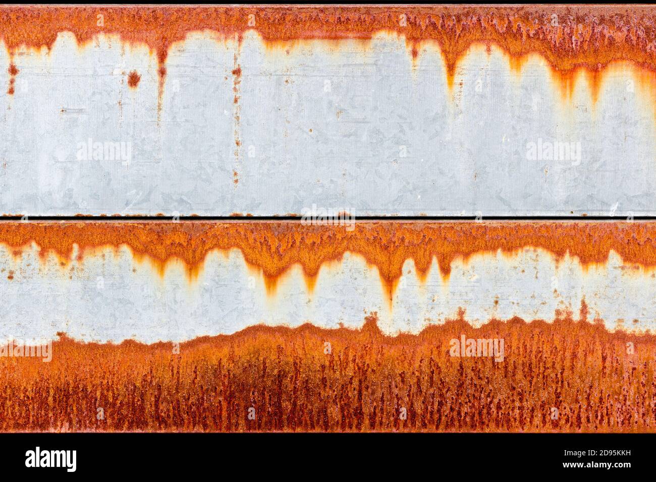 Orange rust patterns on a galvanised steel metal surface Stock Photo ...