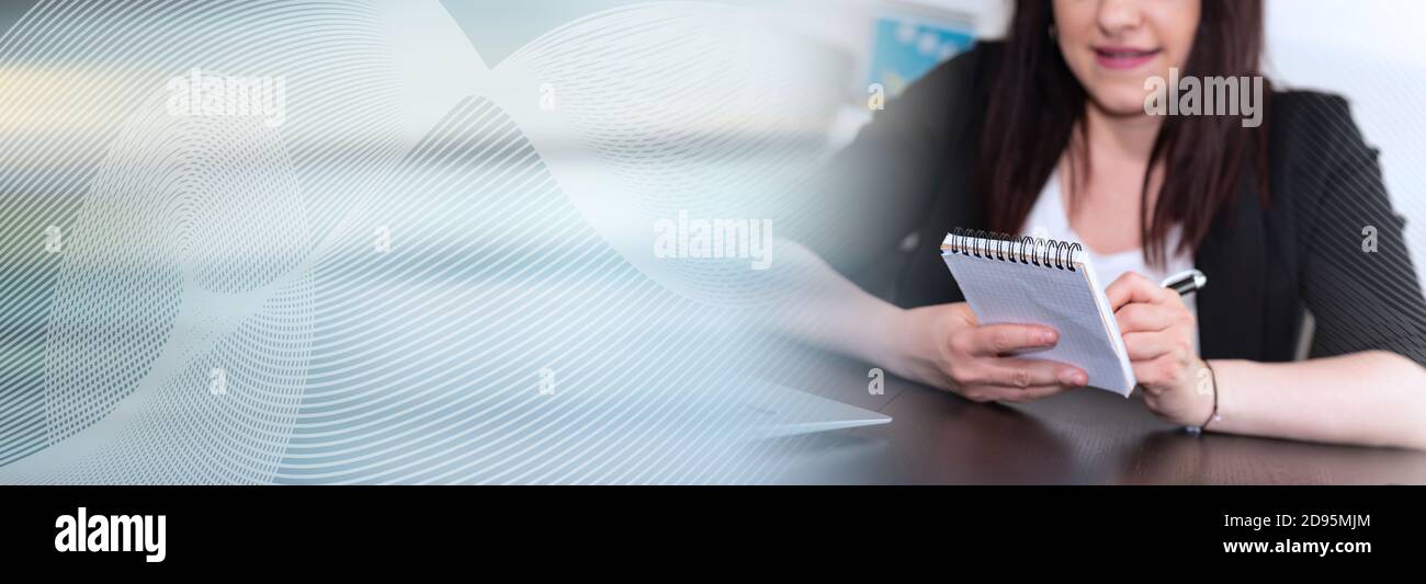 Young woman taking notes on notepad; panoramic banner Stock Photo - Alamy