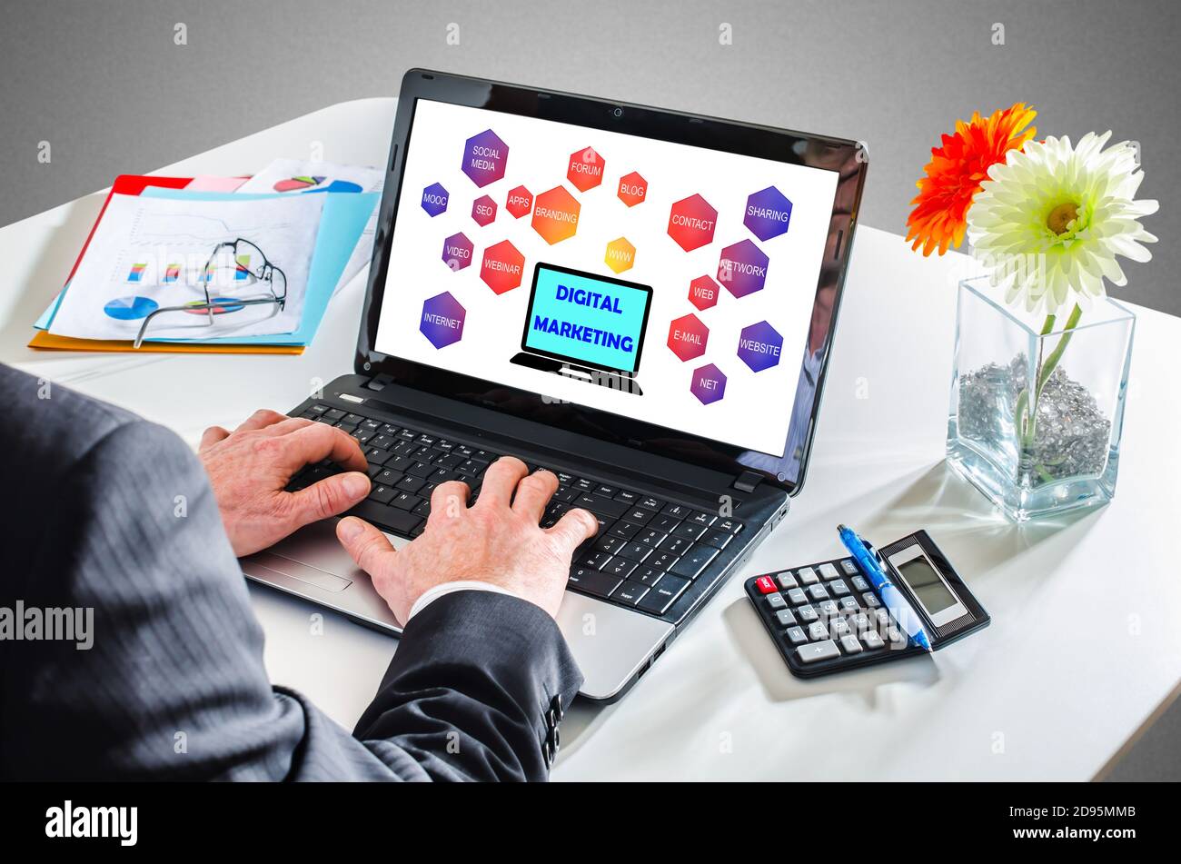 Man typing on a laptop showing a digital marketing concept Stock Photo ...