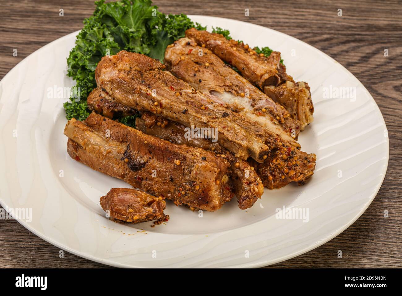 Stewed pork ribs with spices and herbs Stock Photo - Alamy
