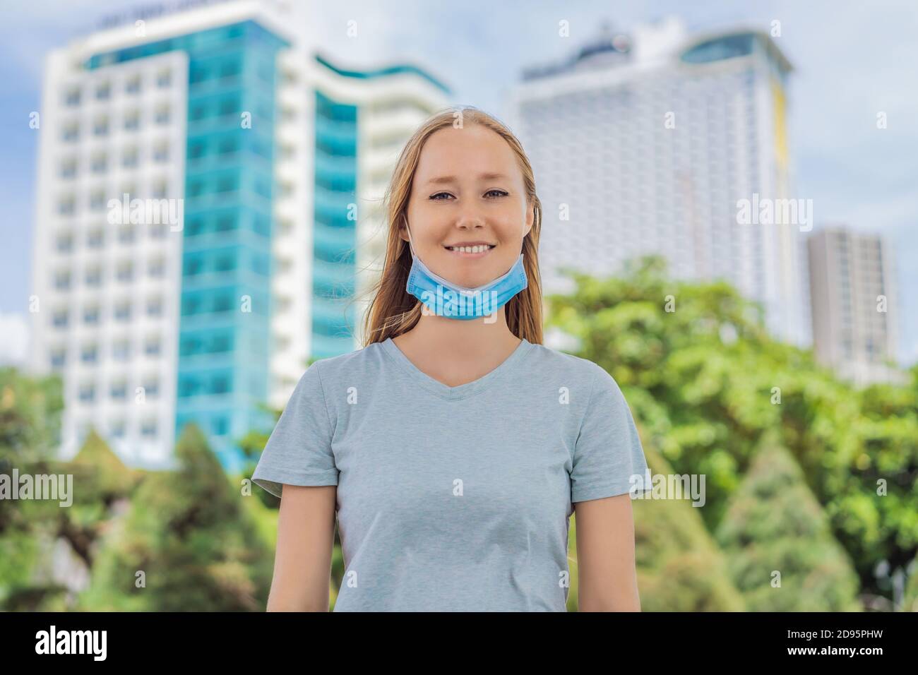 Improper wearing of mask concept. Woman wearing mask wrong Stock Photo ...