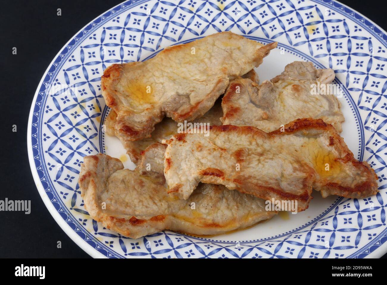 Pork meat cooked ready to eat Stock Photo - Alamy