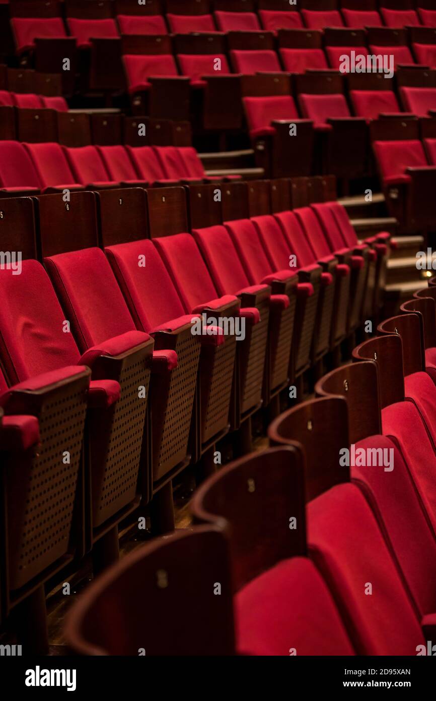 Empty concert hall with red chairs Stock Photo - Alamy