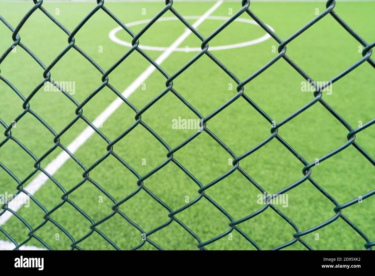 Fence netting close-up on a background of a soccer field Stock Photo ...