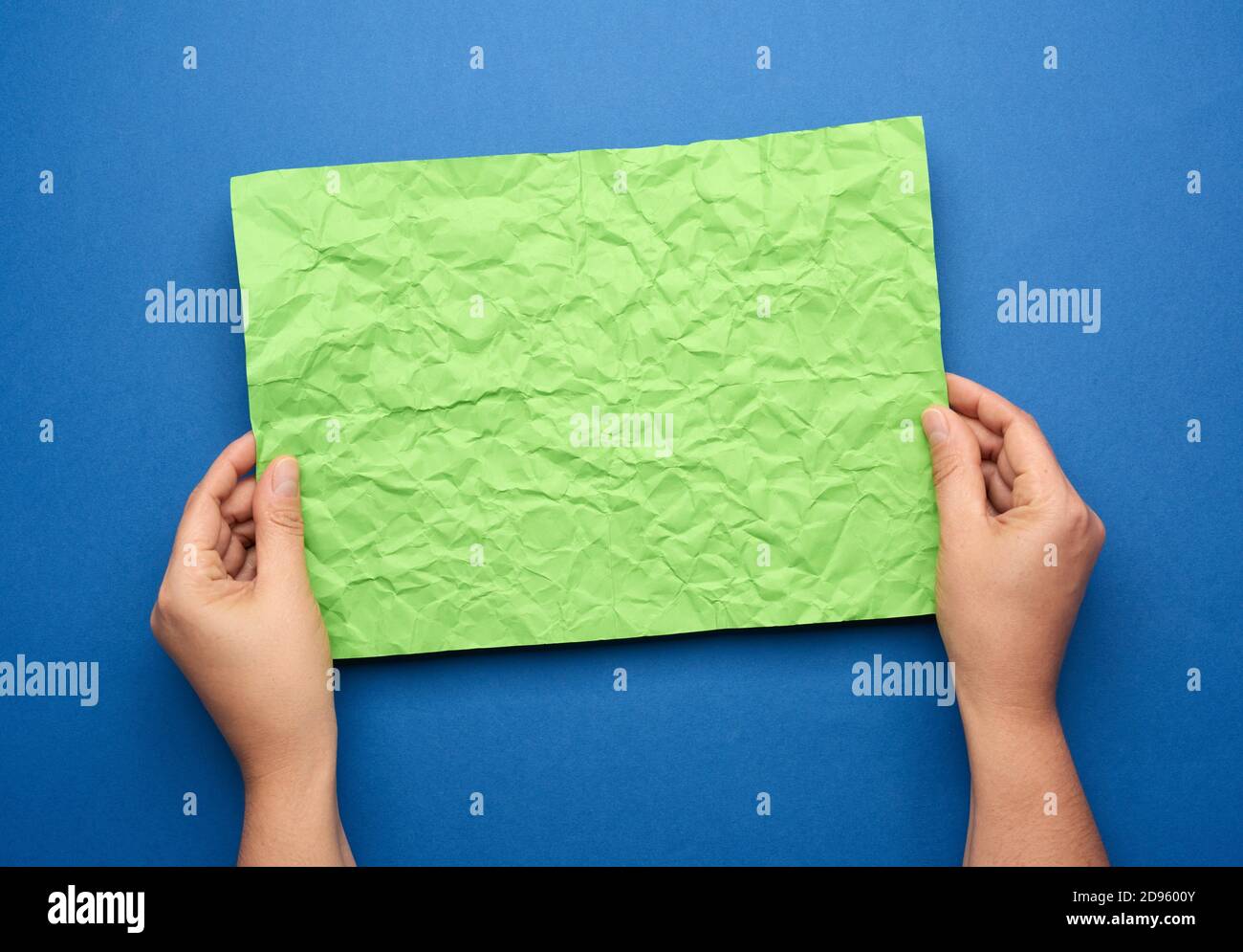 Crumpled up paper hands hi-res stock photography and images - Alamy