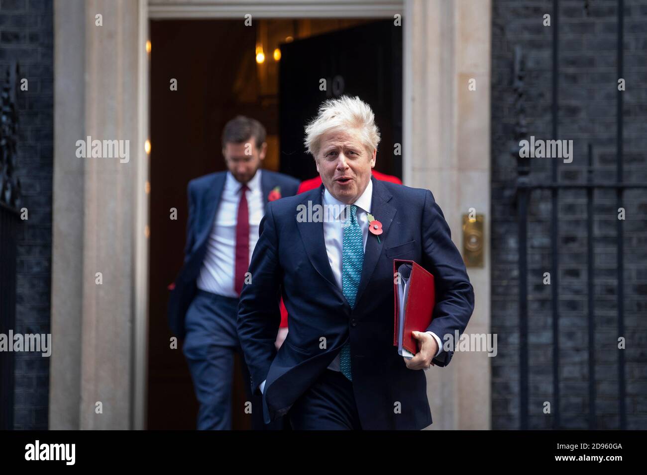 Prime Minister Boris Johnson walks across Downing Street, London, ahead ...