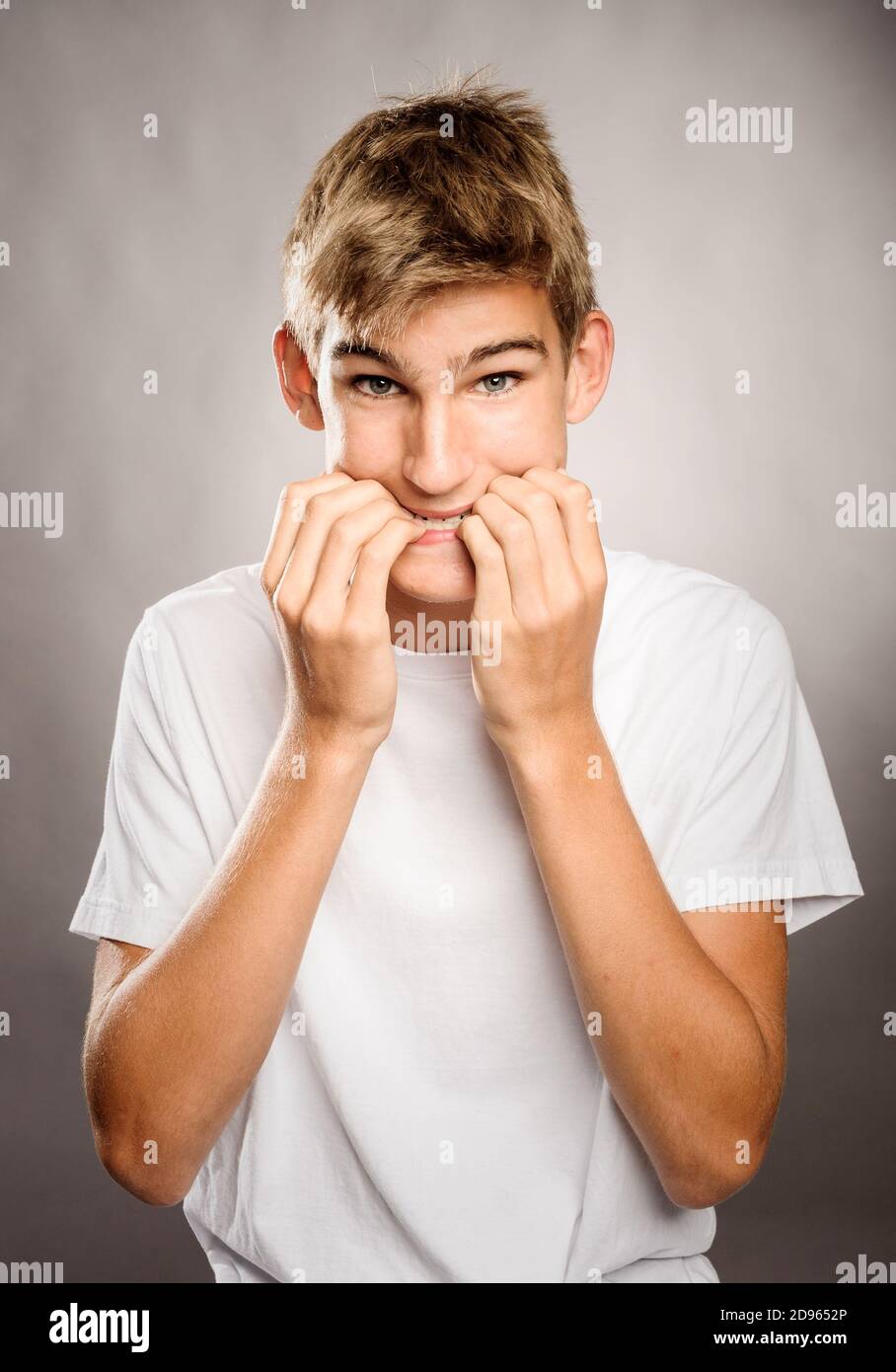 portrait of young boy scared Stock Photo - Alamy