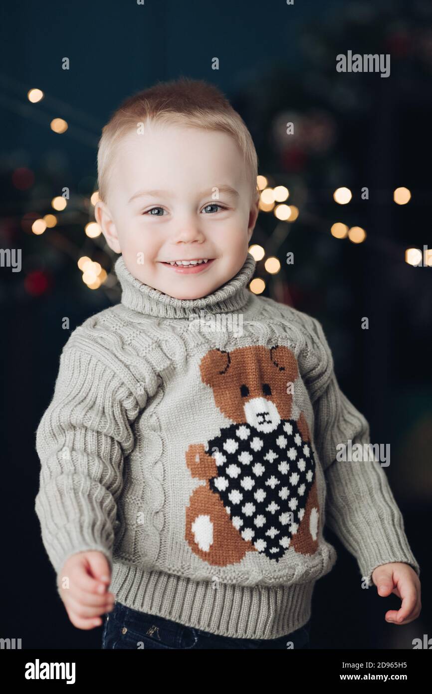 Cute boy christmas sweater hi-res stock photography and images - Alamy