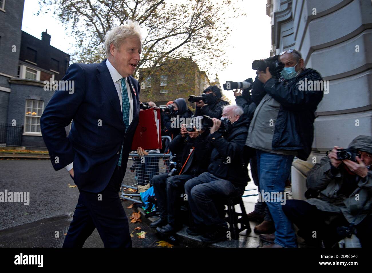 Prime Minister Boris Johnson walks across Downing Street, London, ahead ...