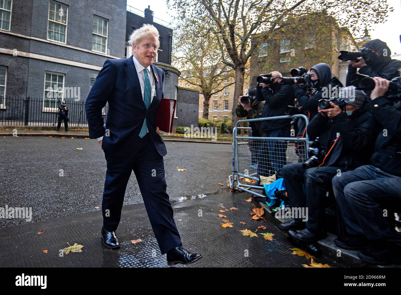 Prime Minister Boris Johnson walks across Downing Street, London, ahead ...