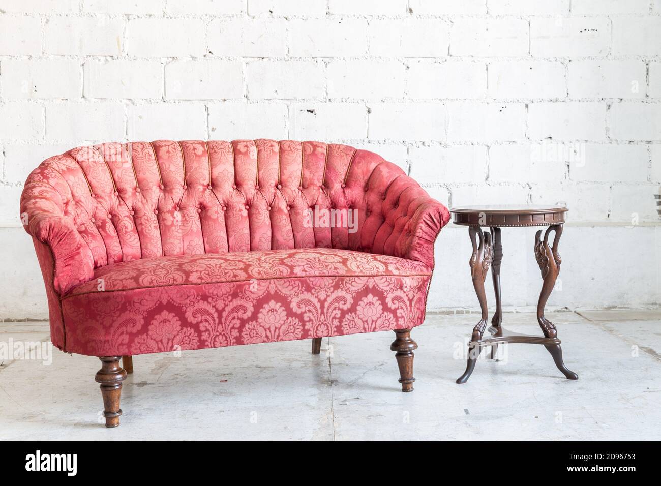 Red sofa couch in vintage room - classical style Stock Photo - Alamy