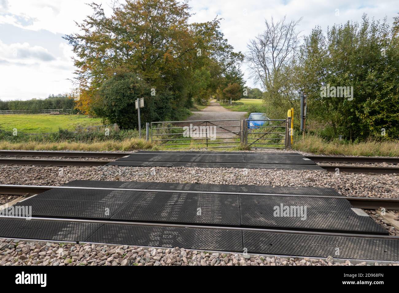 Rural railway level crossing signage Stock Photo - Alamy