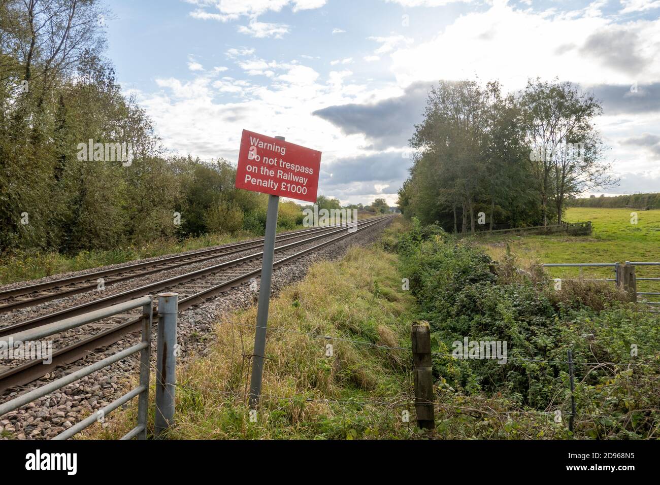Rural railway level crossing signage Stock Photo - Alamy