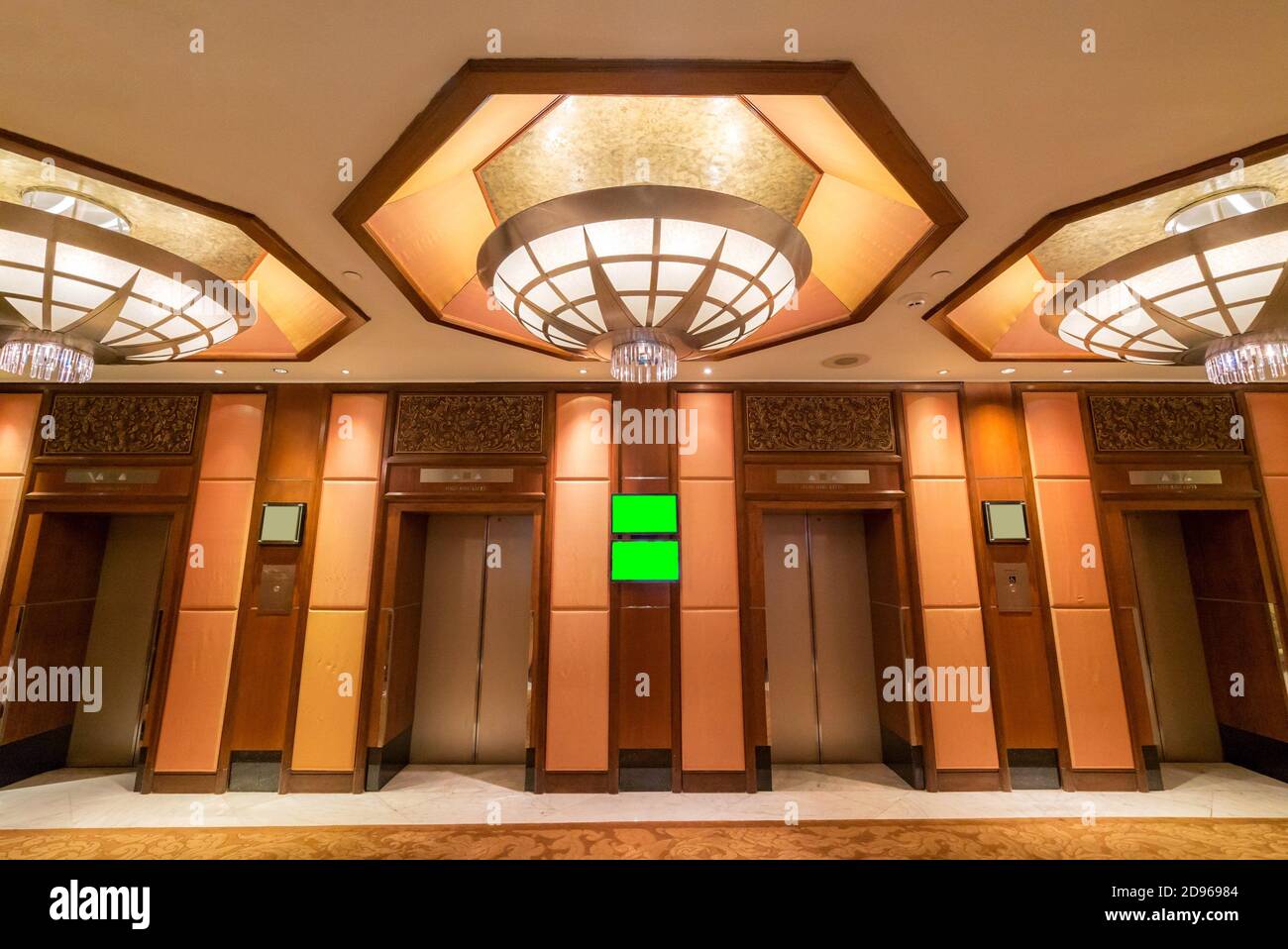 Front view of a modern elevator with closed doors in lobby Stock Photo ...