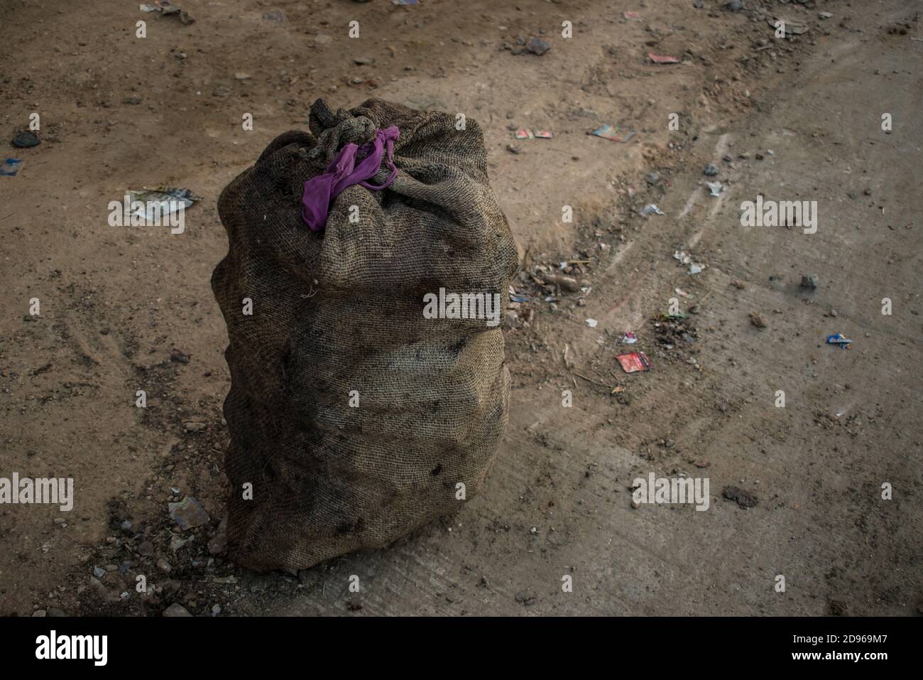 Old stuffed dirty sack in an abandoned area Stock Photo - Alamy