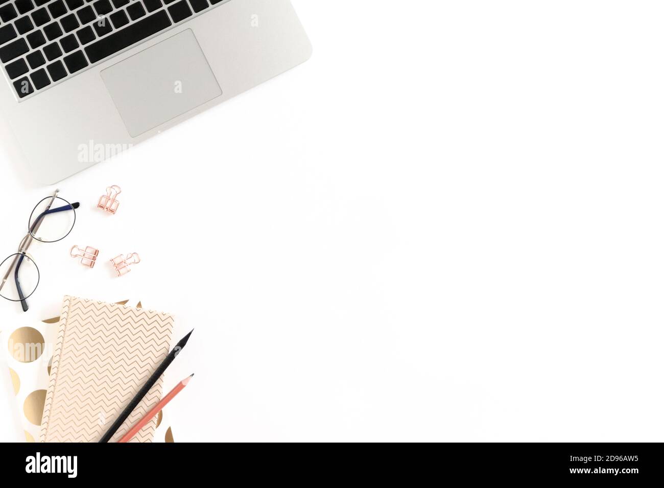 Border frame made of laptop, notepads, glasses and stationery on white ...