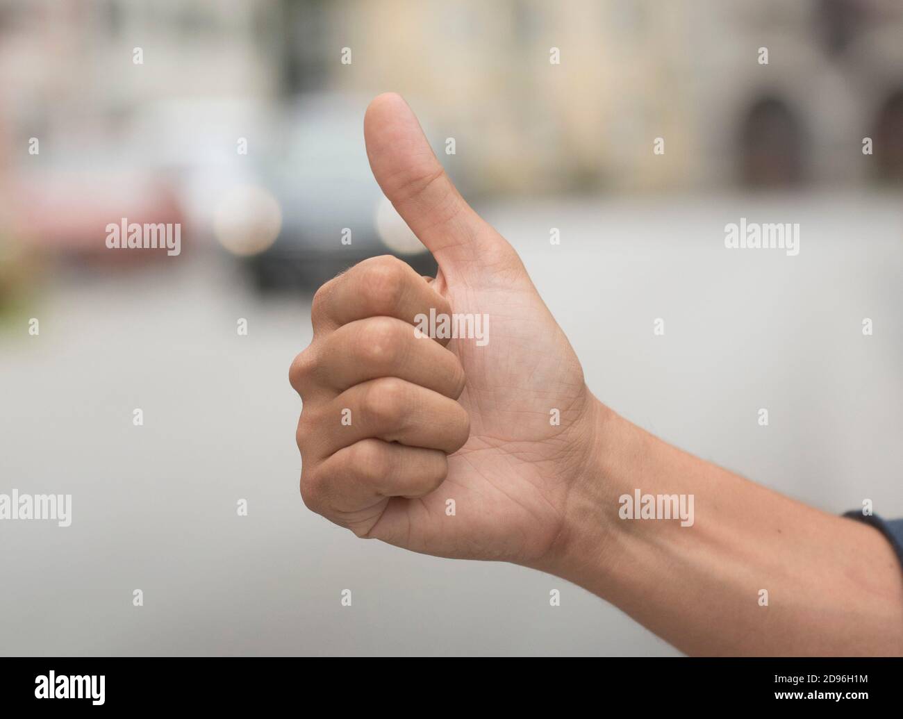 thumbs up, a hand gesture that symbolizes approval and positivity Stock ...