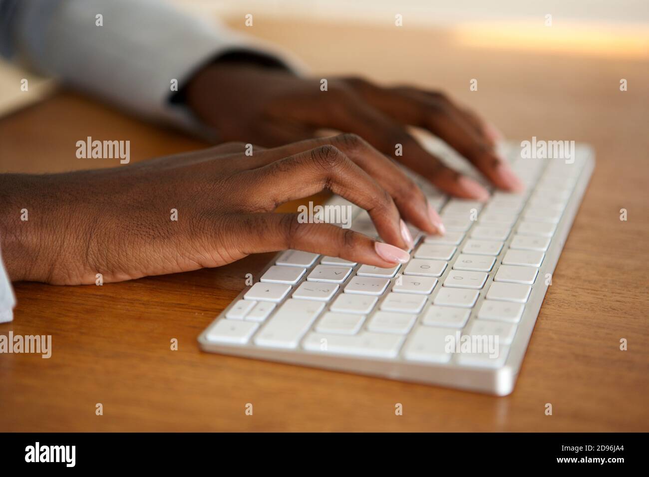African typing female keyboard hi-res stock photography and images - Alamy