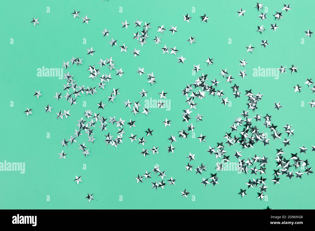 Silver stars on mint background. Holiday concept Stock Photo - Alamy