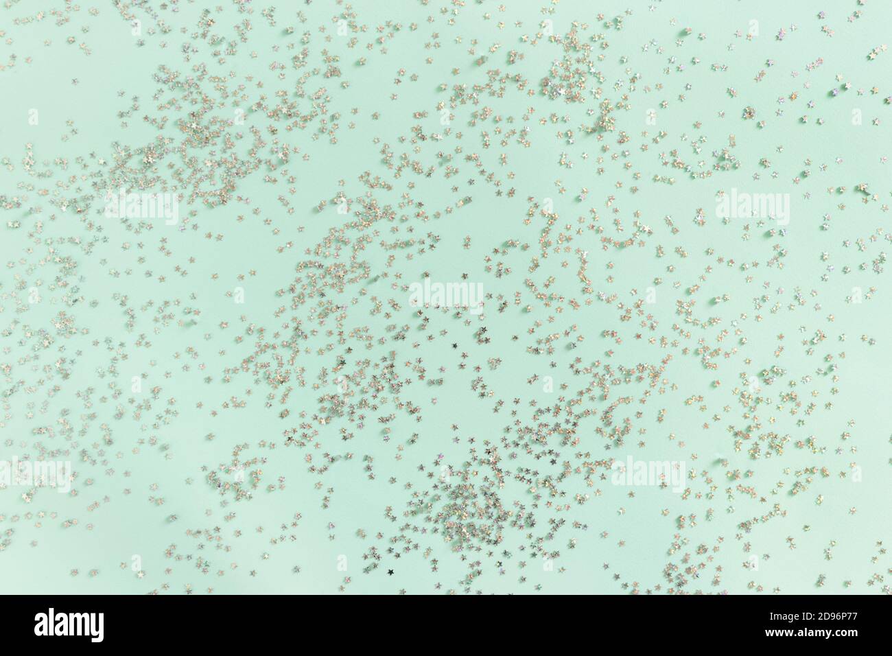 Texture made of silver glitter stars on a mint background Stock Photo ...