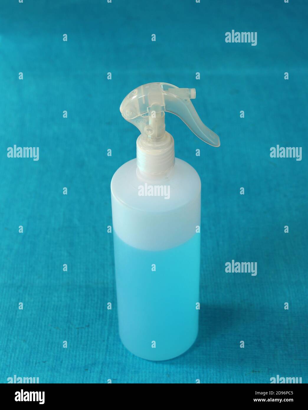 Blue hand sanitizer spray hi-res stock photography and images - Alamy