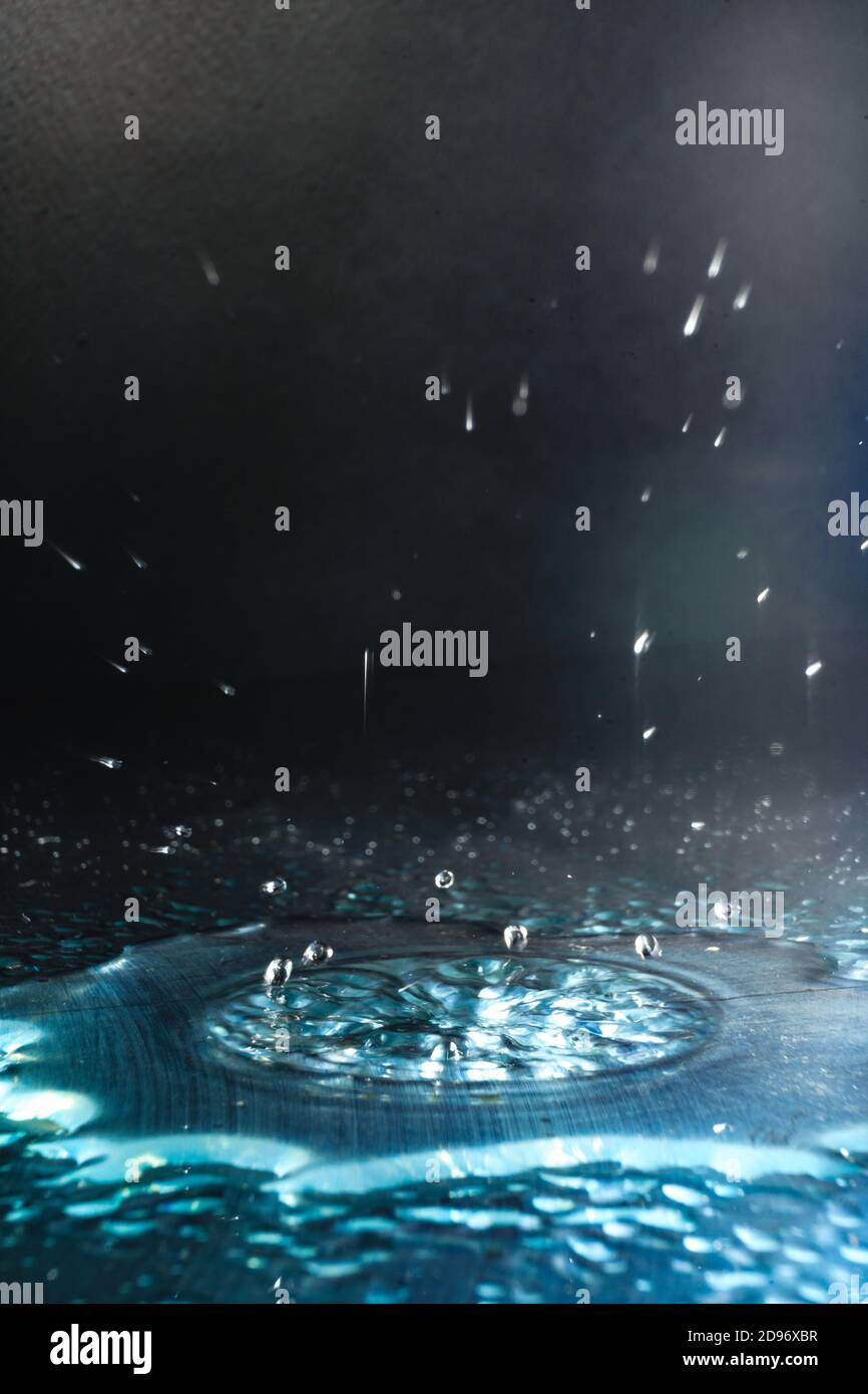 High-speed shot of a splash of water on a smooth surface Stock Photo ...