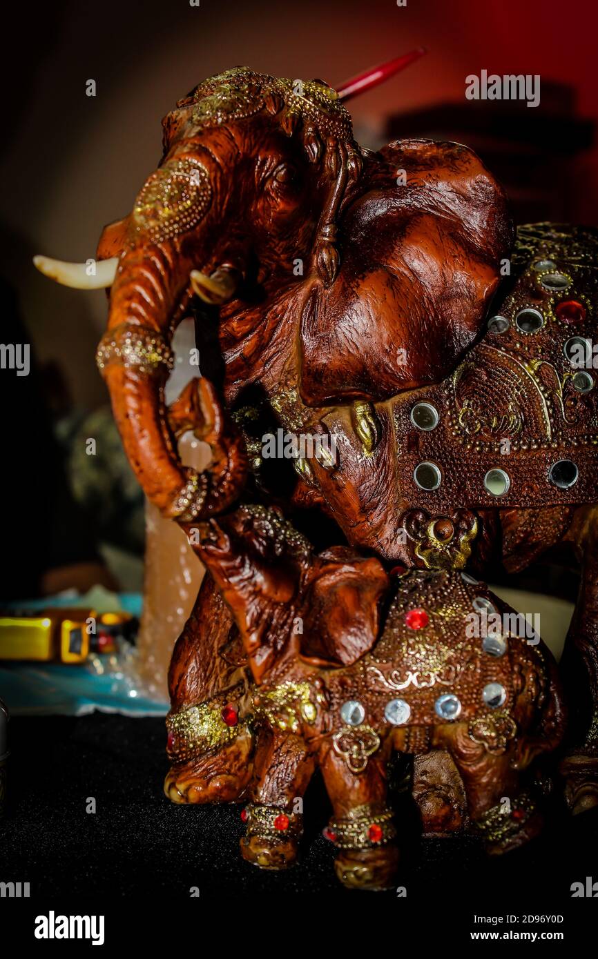 Hand Crafted Wooden Elephant parent and young Stock Photo - Alamy
