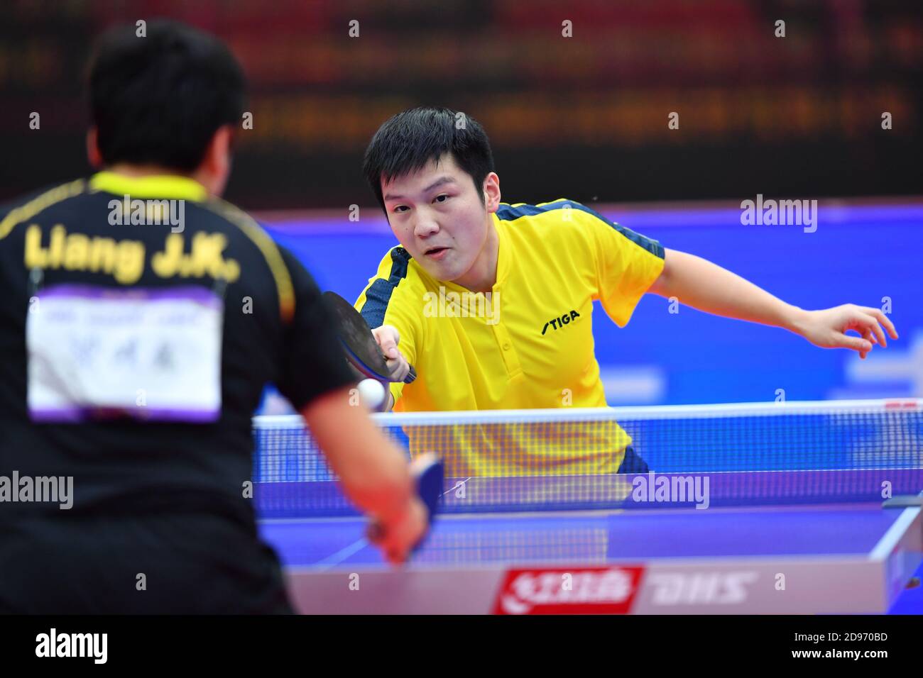 Chinese table tennis player Fan Zhendong competes against Chinese table ...