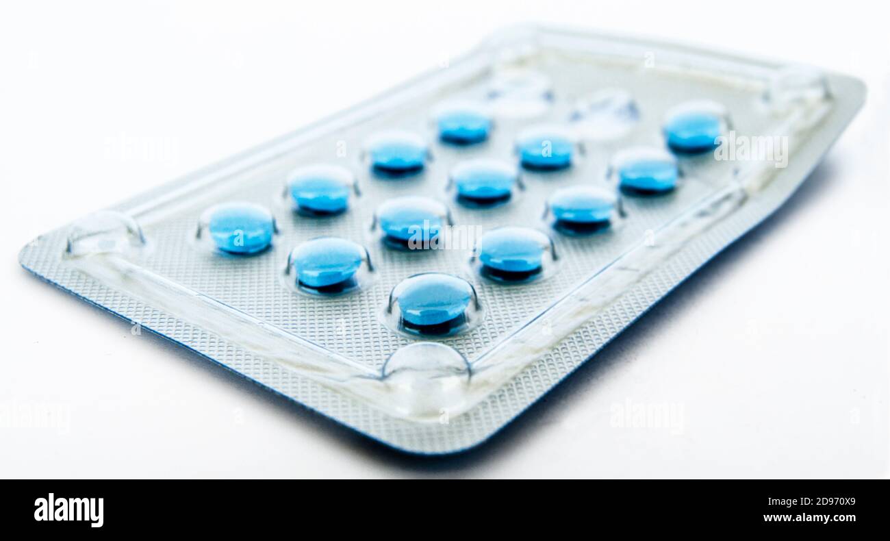 Blue pills in blister pack Stock Photo - Alamy