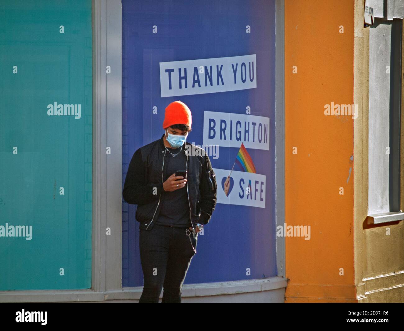 Masked man mobile phone hi-res stock photography and images - Alamy